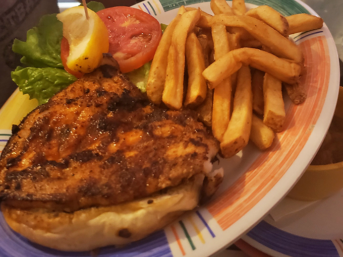 Blackened perfection on a bun. This sandwich isn't trying to impress anyone with height or garnish&mdash;it lets that perfectly seasoned fish do all the talking. 