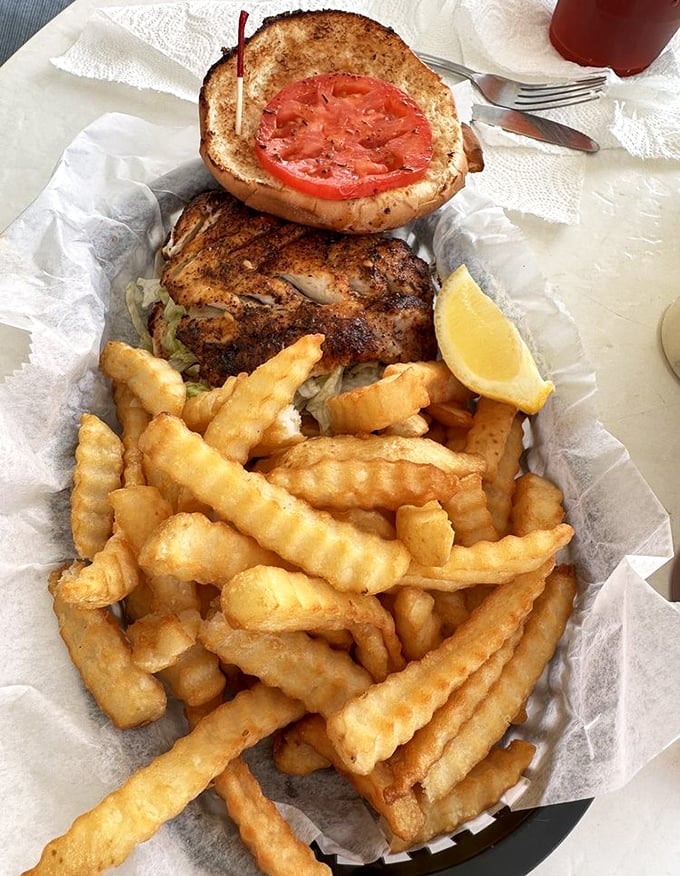 The star of the show: A blackened grouper sandwich that makes you wonder why you'd ever order anything else. Those crinkle-cut fries aren't just sidekicks.