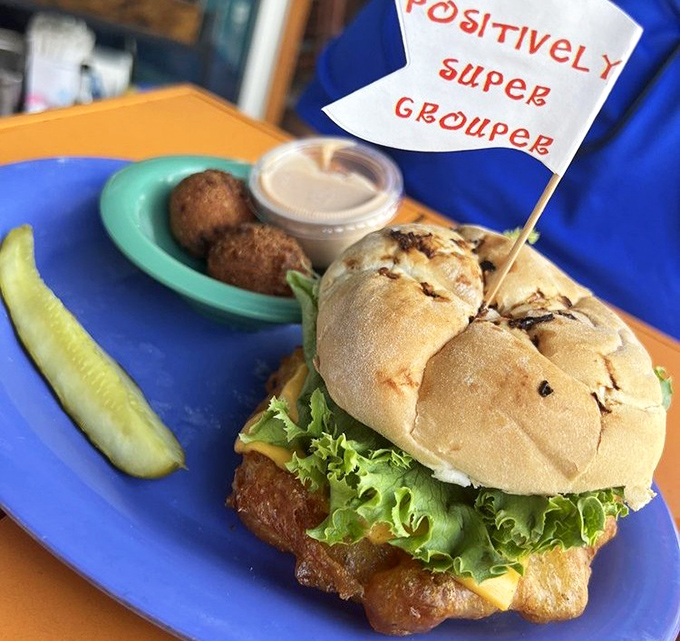 This grouper sandwich looks like it could star in its own fishing show &ndash; golden, glorious, and absolutely massive.