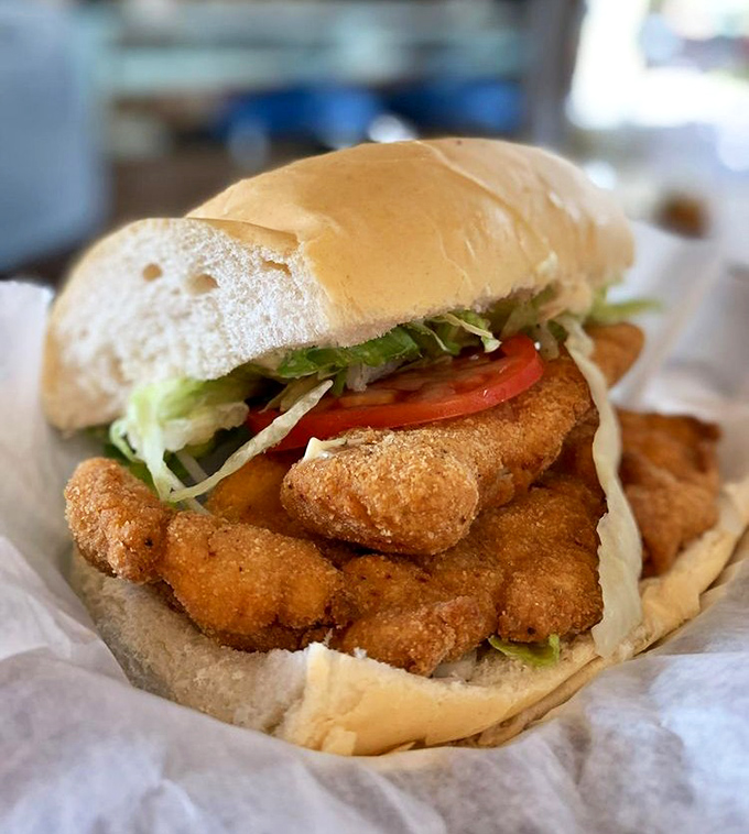 The legendary grouper sandwich in all its glory. More fish than bread, more flavor than should be legal in one handful.