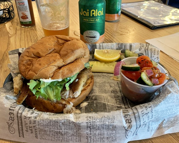 The legendary grouper sandwich arrives like a seafood celebrity &ndash; perfectly bronzed, generously portioned, and ready for its close-up. No wonder locals make pilgrimages here.