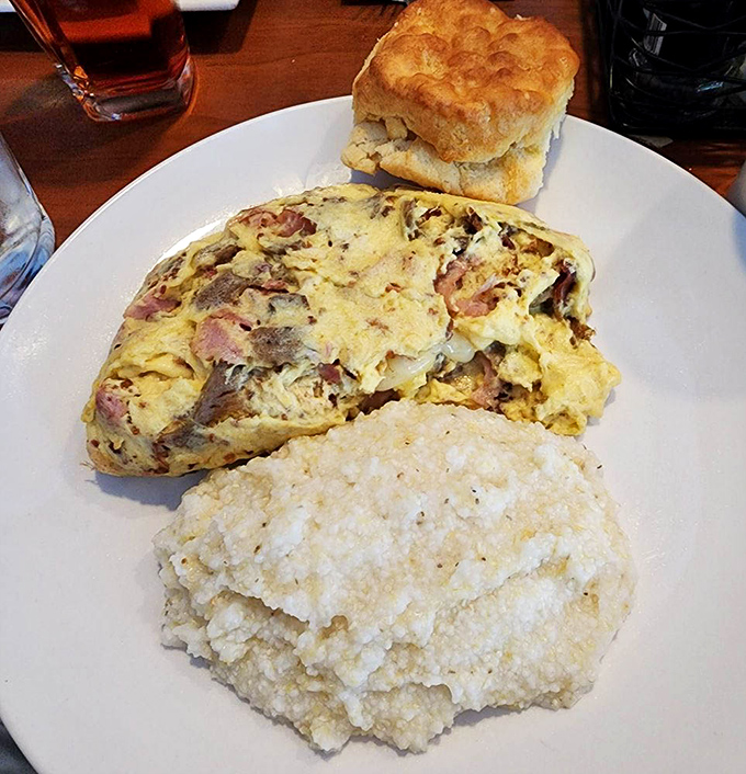 This isn't just an omelet—it's a breakfast apartment complex where ham and cheese have moved in together and invited all their friends.