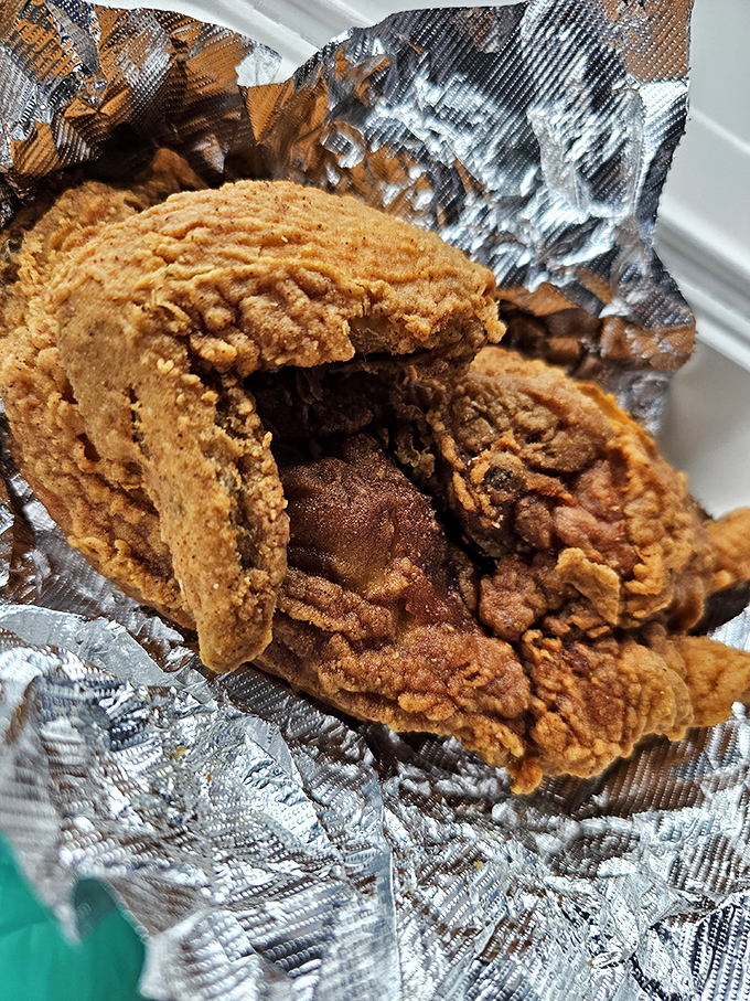 Golden-brown perfection that makes you want to write poetry. This half chicken's crackling exterior guards juicy meat within like a delicious fortress.