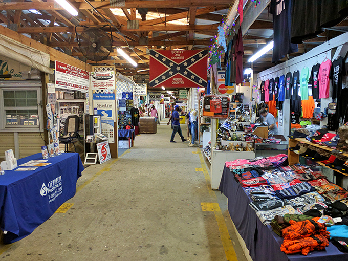 The Confederate flag hangs prominently among various merchandise, a controversial reminder that flea markets often reflect the complex cultural tapestry of their communities.