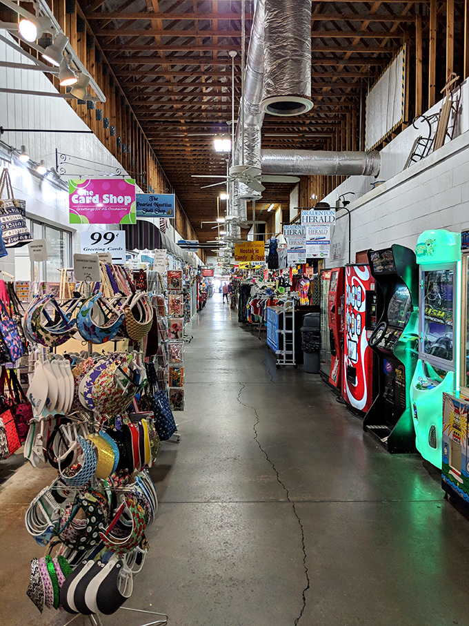 Long corridors lined with vendor stalls invite exploration, where exposed beams and industrial charm create the perfect backdrop for discovery.
