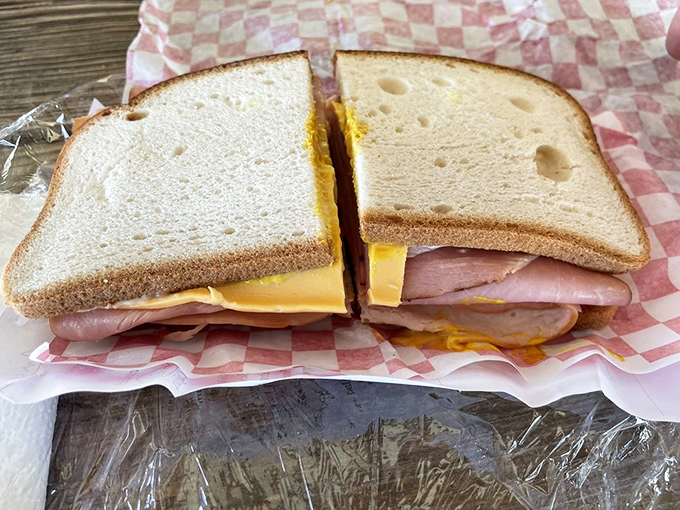 Behold the humble ham and cheese sandwich, elevated to art form through perfect proportions and quality ingredients that speak for themselves.