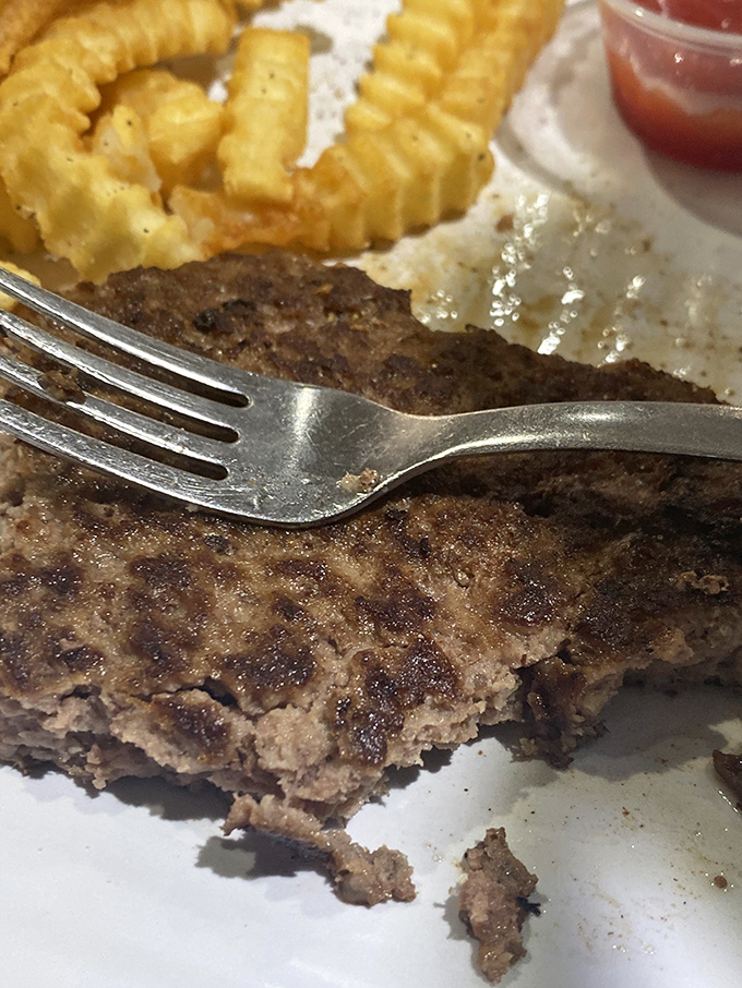 The star of the show - a perfectly seasoned hamburger steak with that coveted crust that only comes from a well-seasoned grill.