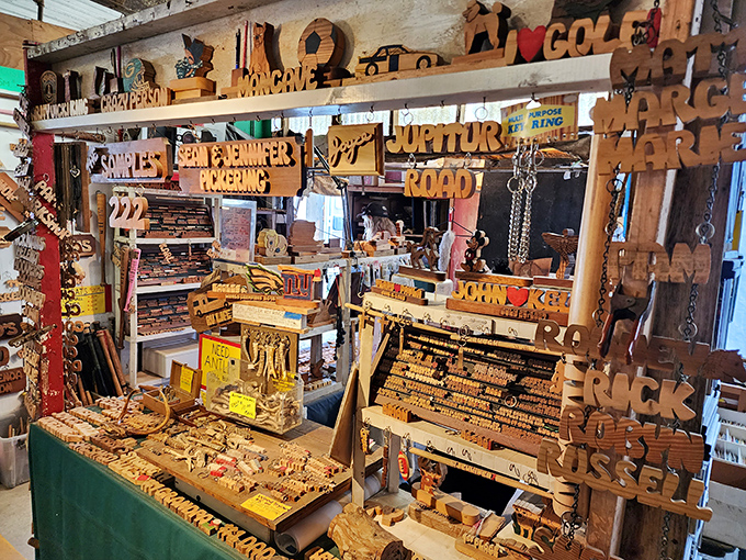 Wooden name puzzles and personalized treasures line every inch of this craftsman's booth. Nothing says "I thought of you" quite like something nobody can return.