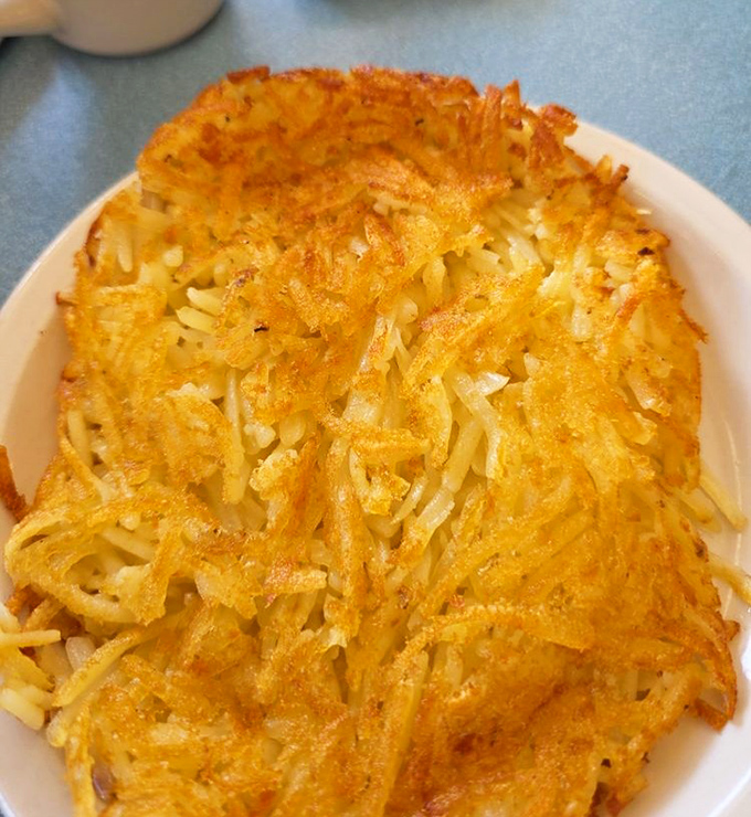 Golden, crispy perfection that makes other hash browns question their life choices. This is potato royalty wearing a deliciously crunchy crown.