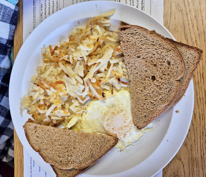 These hash browns achieve that perfect golden-crisp exterior while maintaining a tender interior&mdash;a culinary balancing act that deserves its own Olympic medal.