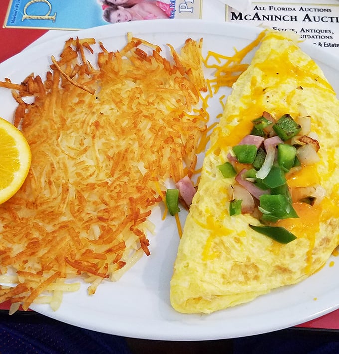 Geometry teachers would approve&mdash;a perfect triangle of cheese-laden omelet meets its crispy hash brown soulmate. Morning mathematics never tasted so good.