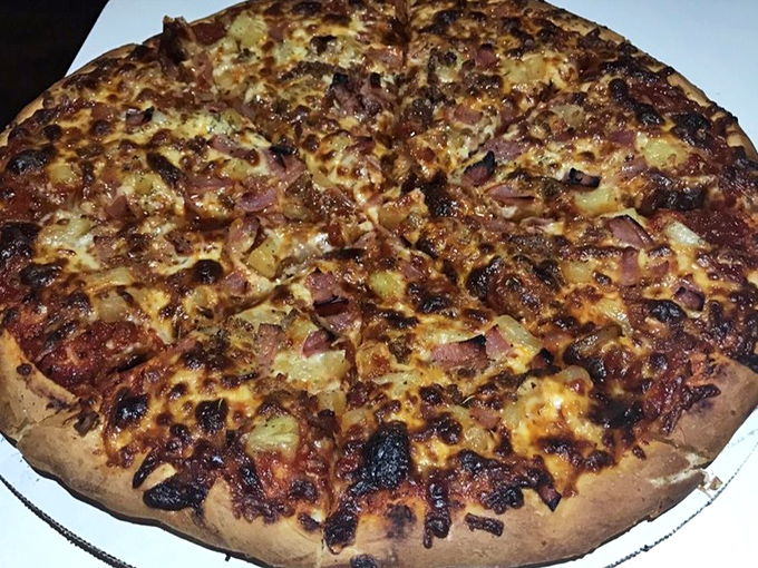 This Hawaiian pizza might finally end the great pineapple debate. When ham and pineapple meld this beautifully, even the skeptics reconsider.
