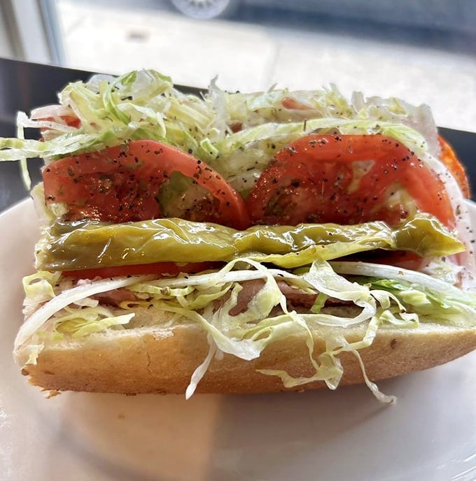 Layer upon layer of fresh ingredients create a hoagie that's more architectural masterpiece than mere sandwich.