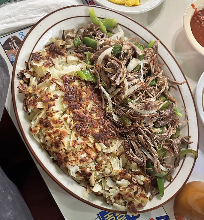 This isn't just breakfast&mdash;it's an architectural marvel of shredded beef, crispy hash browns, and green peppers that would make Frank Lloyd Wright jealous.