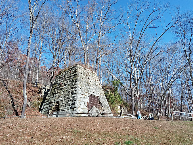 Hope Furnace stands as a stone sentinel to Ohio's industrial past &ndash; where 19th-century workers once stoked fires now cooled by a century of forest growth.