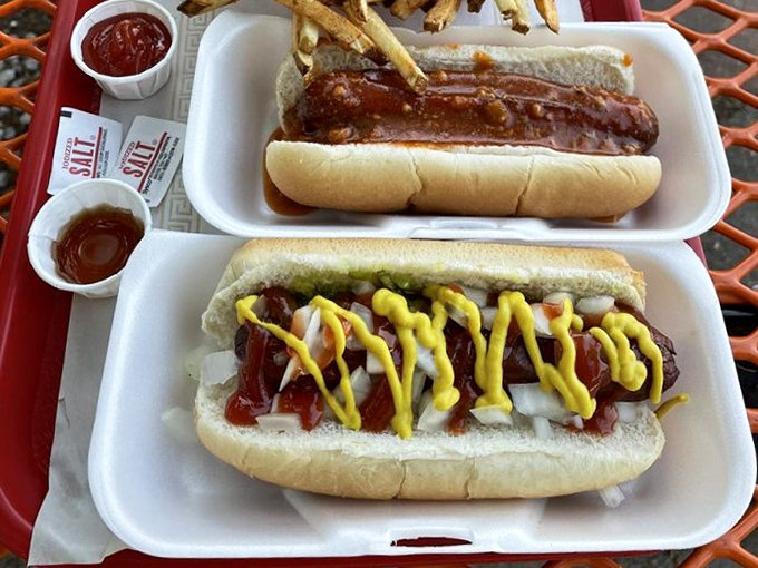 Hot dogs with personality! The classic chili cheese up top, while below, mustard zigzags like a yellow brick road to flavor town.