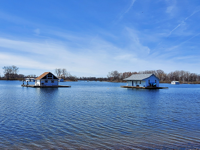Floating cottages dot the calm waters near Presque Isle, offering the ultimate "lakefront property" without the hassle of property taxes or lawn mowing.