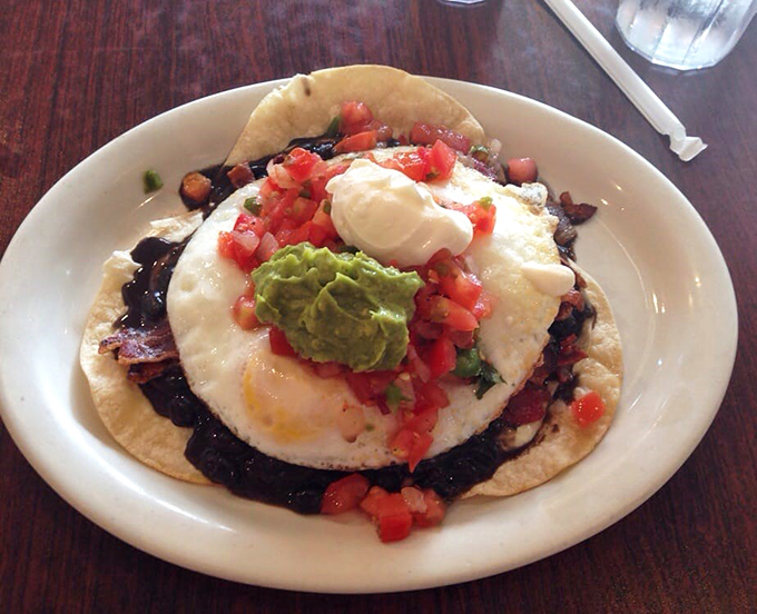 Behold the huevos rancheros that launched a thousand breakfast pilgrimages&mdash;worth every glorious, messy bite.