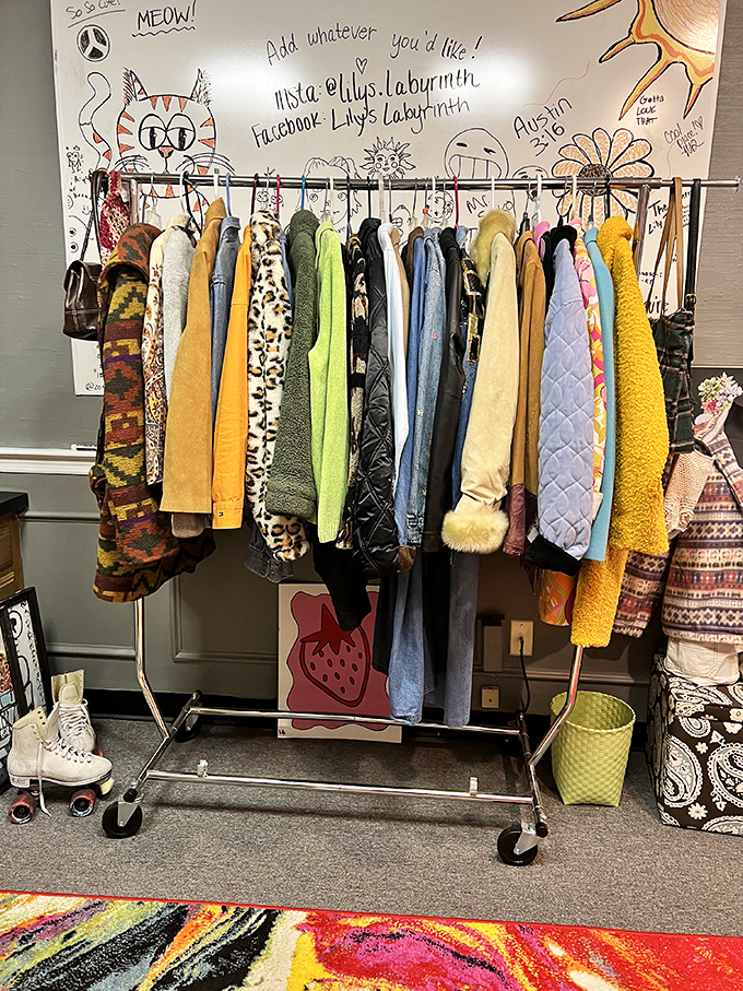 Fashion time travel station! From leopard print to sunshine yellow, these jackets hang beneath a wall adorned with playful doodles.