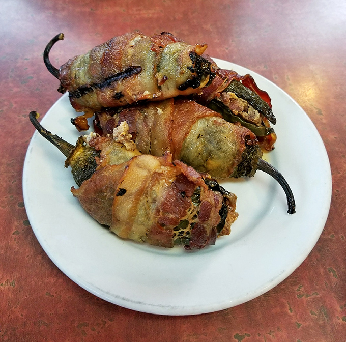 Bacon-wrapped jalape&ntilde;os that could make a vegetarian question their life choices. These "Wolf Turds" deliver a perfect trifecta of heat, smoke, and indulgence.