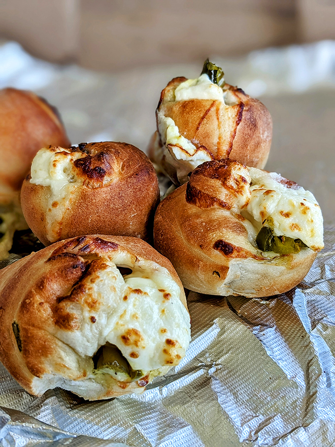 These aren't your average jalape&ntilde;o poppers&mdash;they're golden-brown flavor bombs where crispy exteriors give way to molten cheese-filled peppers.