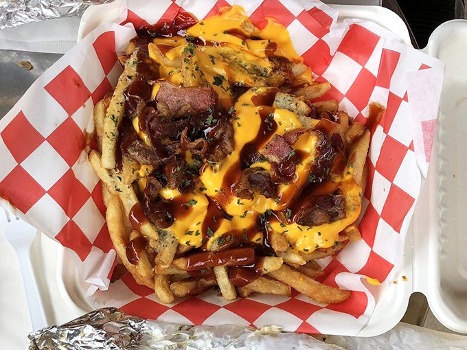 These Jersey Fries aren't just loaded &ndash; they're having an existential crisis under that avalanche of cheese, bacon, and sauce. Worth every napkin.