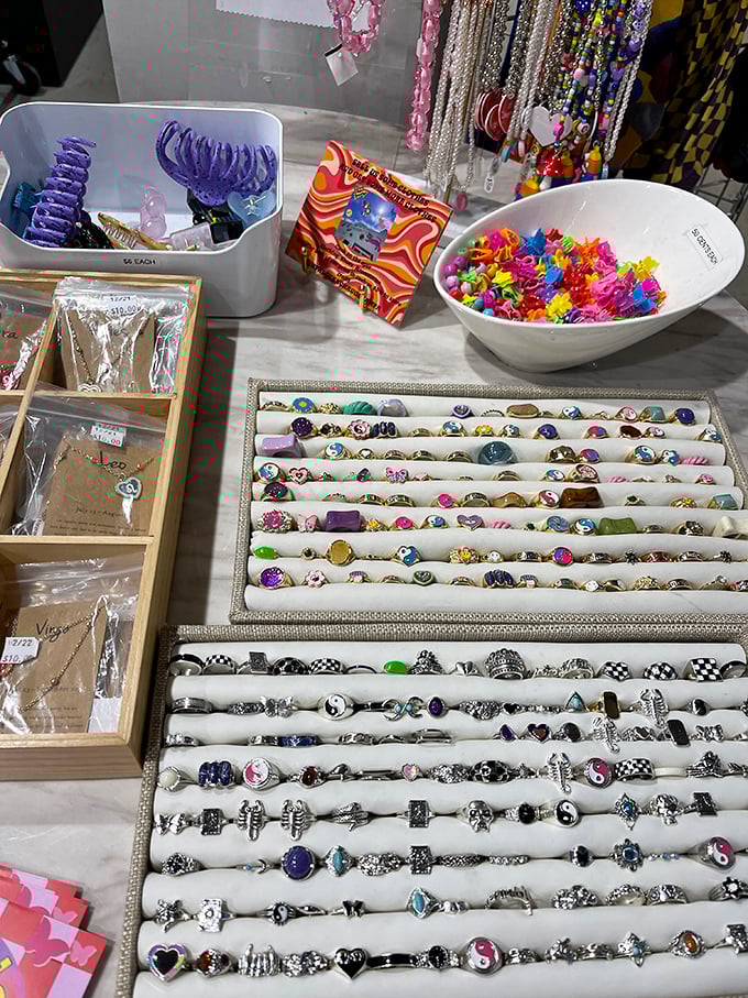Jewelry paradise! From quirky statement rings to delicate everyday pieces, this display proves accessories don't need to break the bank.