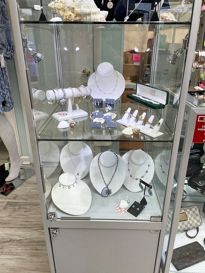 Fine jewelry sparkling under glass like precious artifacts in fashion's most accessible museum.