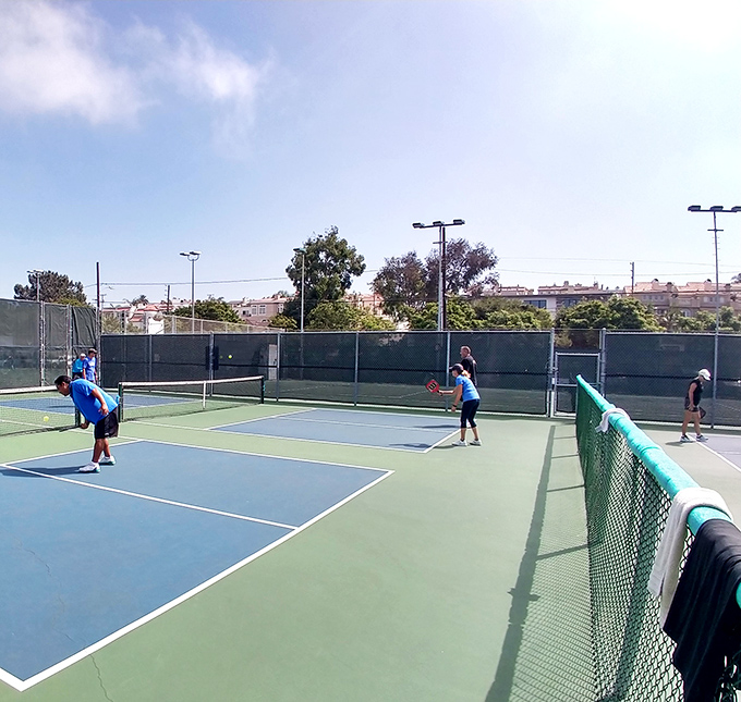 Tennis courts where your backhand gets better just from the ocean breeze and vitamin D overdose.