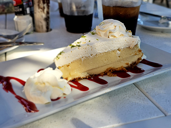 This key lime pie isn't just dessert&mdash;it's a pale yellow slice of sunshine with a perfect graham cracker foundation and whipped cream clouds that might just ruin all other pies for you.