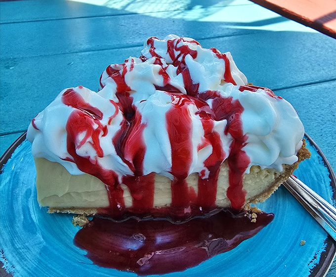 This isn't just key lime pie &ndash; it's a sweet-tart masterpiece crowned with whipped cream and berry sauce that would make Jimmy Buffett write a whole new verse.