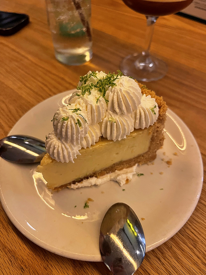 The key lime pie that launched a thousand return visits&mdash;creamy, zesty perfection topped with pillowy whipped cream and lime zest.
