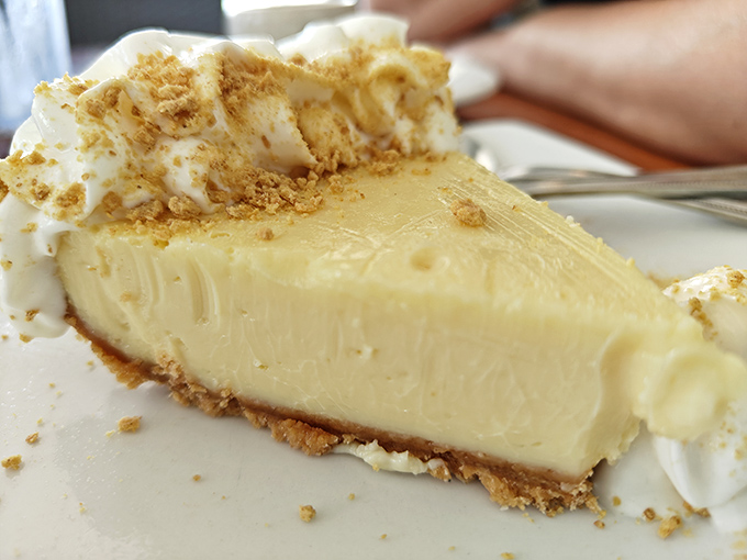 The holy grail of Florida desserts in its natural habitat. This key lime pie achieves that perfect sweet-tart balance that makes you close your eyes involuntarily with each bite.