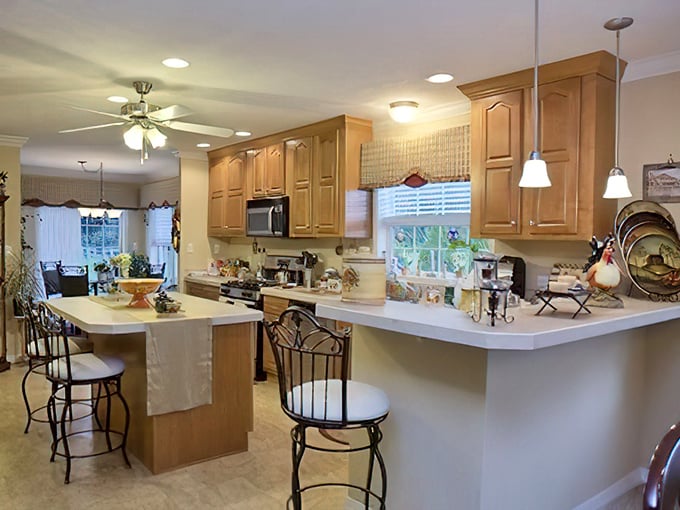 Kitchens designed for real cooking, not just reheating. Ample counter space, breakfast bars, and enough cabinet room to store your collection of "I'll use this someday" gadgets.