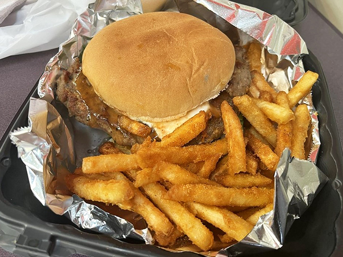 Not all heroes wear capes; some come wrapped in foil with a side of perfectly golden fries. This burger doesn't need Instagram filters to look this good.