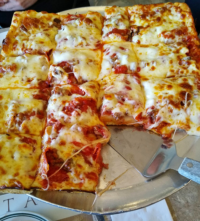 This square pizza isn't just cutting corners&mdash;it's creating more crispy edges for that perfect balance of gooey cheese and slightly charred crust.