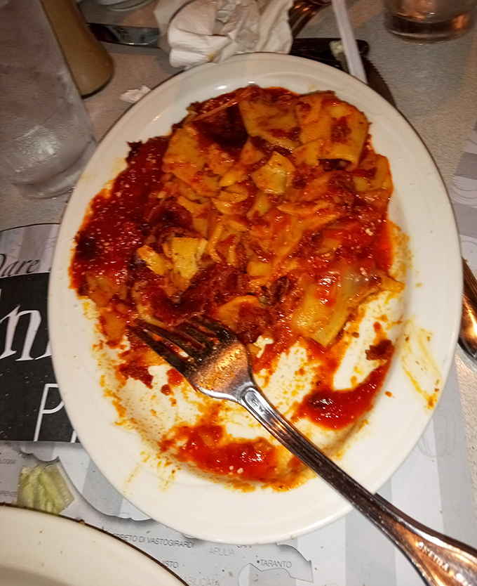 Behold the lasagna that launched a thousand food comas! Those layers aren't just pasta and sauce&mdash;they're edible archaeology, each stratum telling a delicious story.