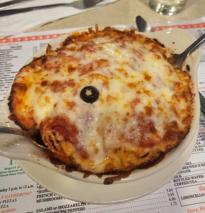 This isn't just lasagna&mdash;it's an archaeological dig of flavor, each layer revealing new depths of cheese, sauce, and seasoning that make you want to frame your fork.