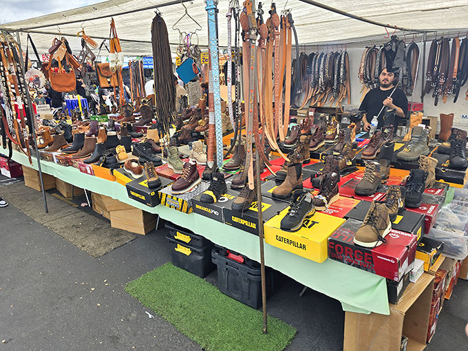 Work boots, hiking gear, and leather accessories create a footwear fortress. If Imelda Marcos shopped on a budget, this would be her first stop.