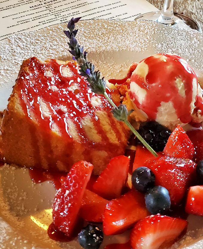 This isn't just dessert; it's edible artwork. Pound cake elevated to celebrity status with fresh berries and what appears to be homemade ice cream.