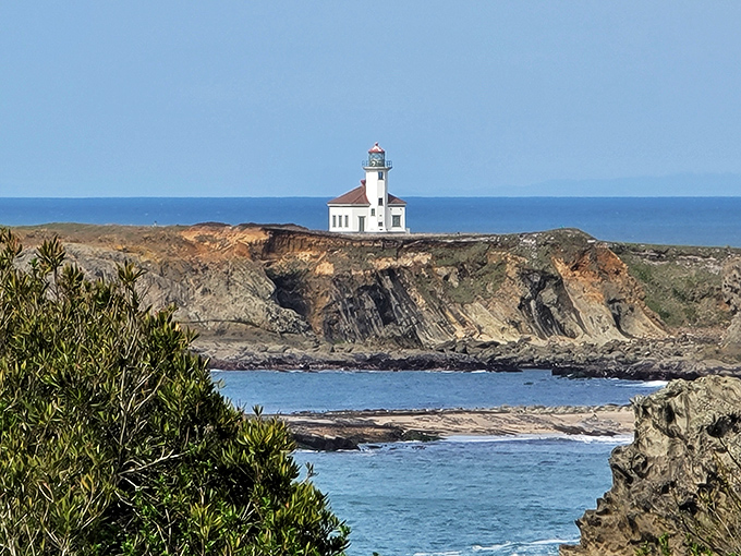 That little lighthouse standing proudly on the headland, like the world's most picturesque hall monitor keeping watch over the Pacific playground.
