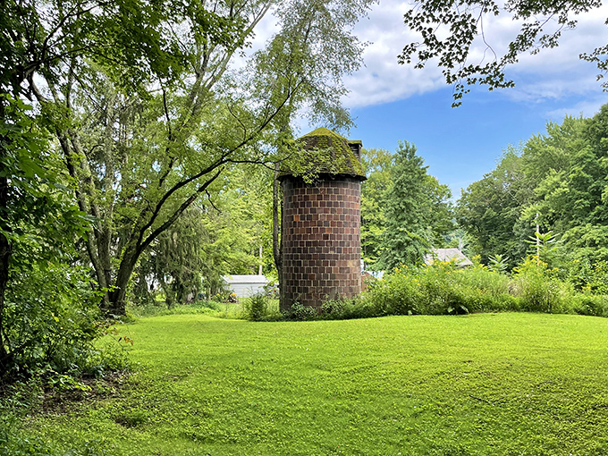 This brick silo stands like a stubborn reminder of simpler times. If only these walls could talk&mdash;they'd probably tell you to slow down and enjoy the view.