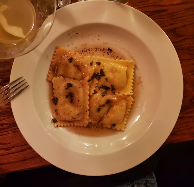 Four perfect pillows of pasta, each filled with lobster treasure. This isn't just dinner; it's what Italian dreams are made of.