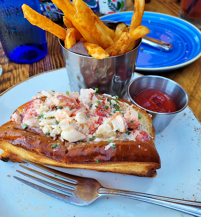 The star of the show: chunks of sweet lobster meat nestled in a buttery roll, with fries standing at attention like they know they're in good company.