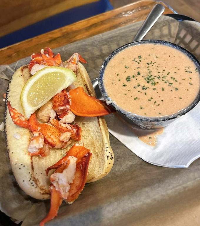 This isn't just any lobster roll &ndash; it's quarter-pound of sweet, succulent meat paired with that velvety bisque that'll make you close your eyes in bliss.