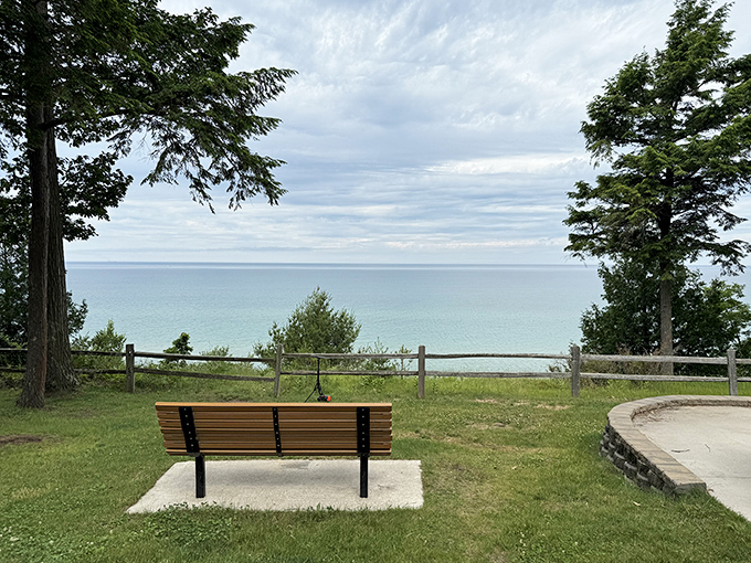 Nature's therapy session: one bench, an endless horizon of Lake Michigan blue, and absolutely zero notifications pinging your phone.