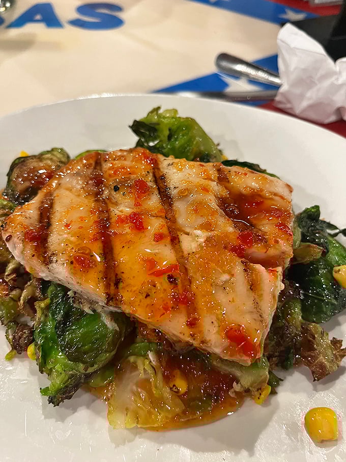 That mahi mahi arrives looking like it just graduated from grilling school with highest honors and a tan.