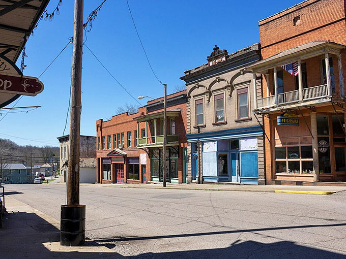 Sunlight plays across Shawnee's colorful facades, highlighting architectural details from an era when buildings were designed to both impress and endure.