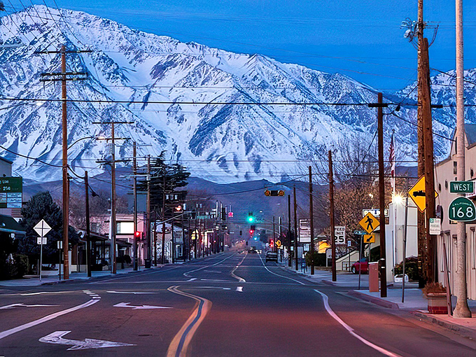 Twilight transforms Bishop into a magical realm where snowcapped mountains hover like guardians over the sleepy town below.