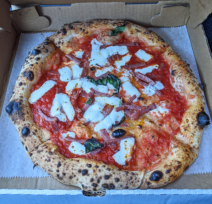 Behold the pizza that launches a thousand road trips&mdash;charred perfection, molten cheese, and that crust with its beautiful leopard spots.